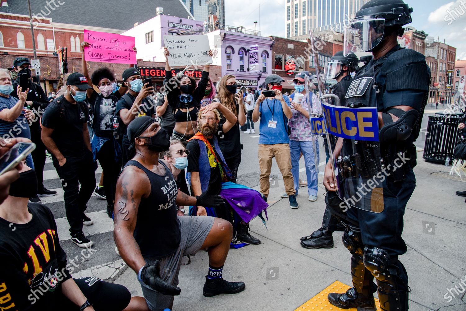 Protestors Kneel Front Police Officers Holding Editorial Stock Photo ...
