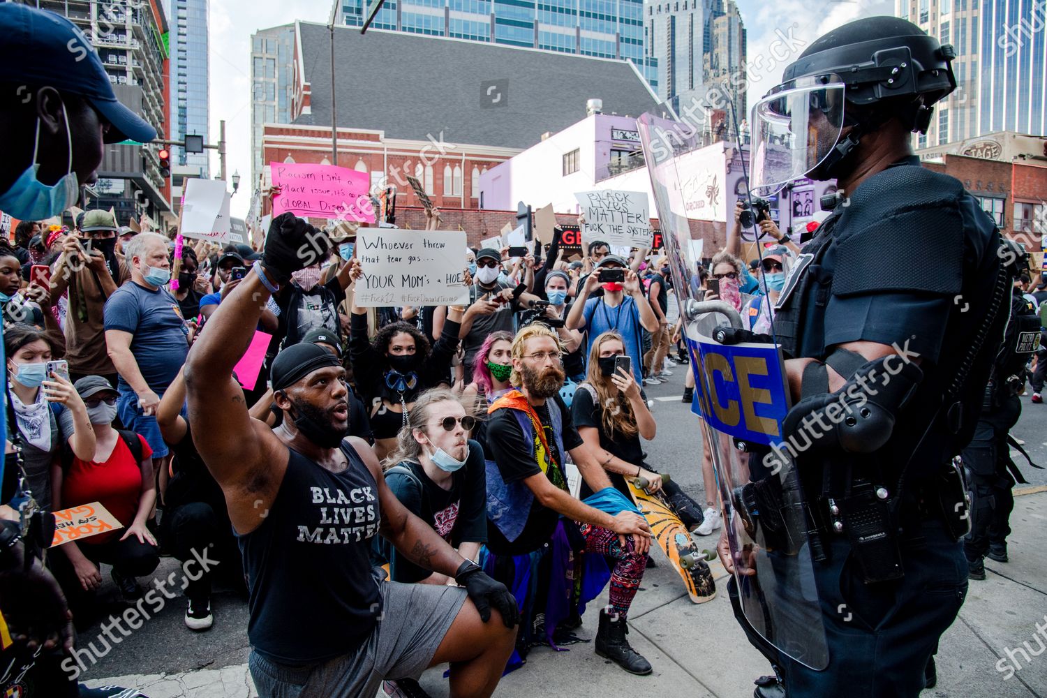 Protestors Kneel Front Police Officers Holding Editorial Stock Photo ...