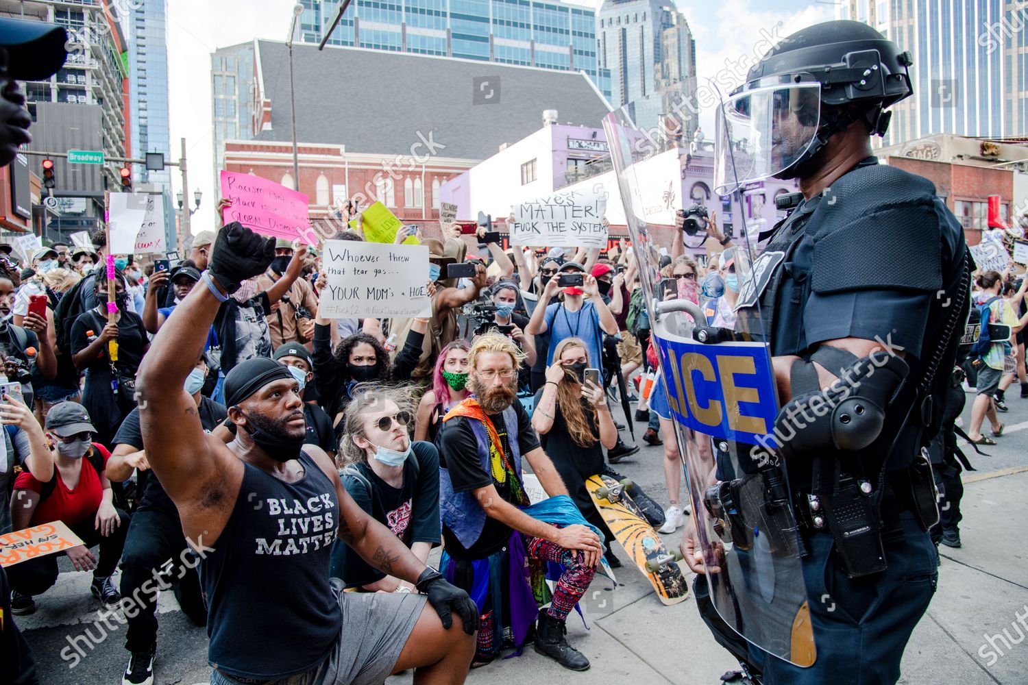 Protestors Kneel Front Police Officers Holding Editorial Stock Photo ...