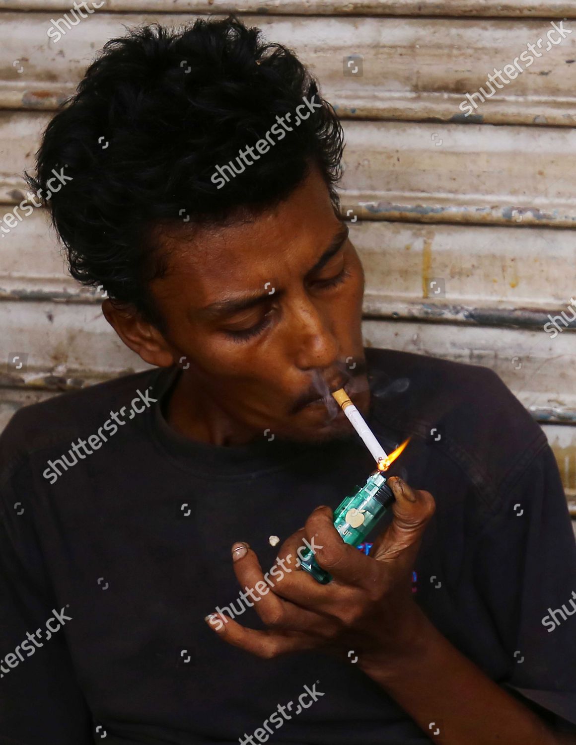 Pakistani Drug Addict Smokes Heroine On Editorial Stock Photo - Stock ...