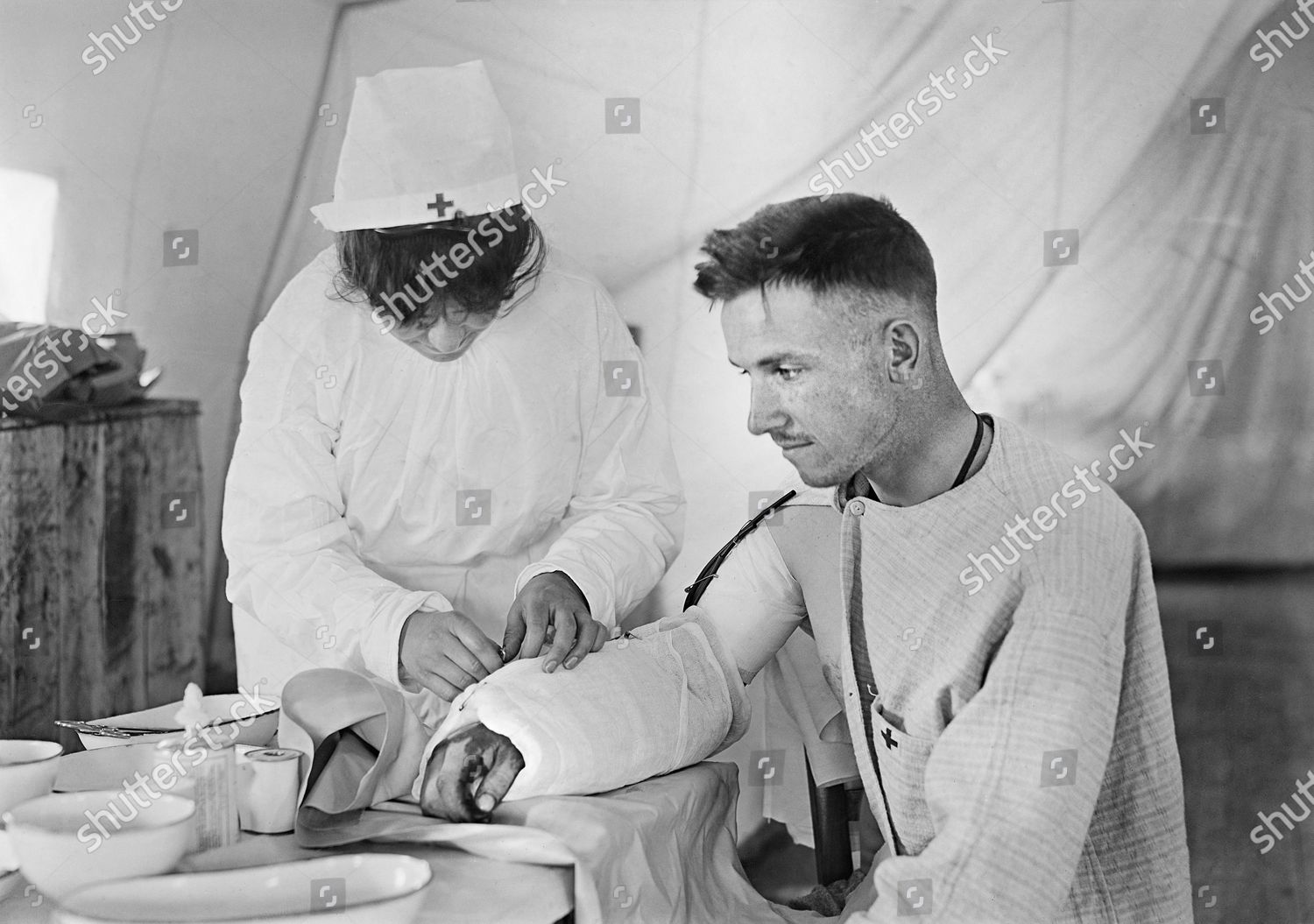 American Red Cross Nurse Bandaging Arm Editorial Stock Photo - Stock ...