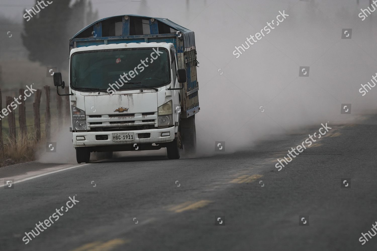 Vehicles Travel On Road Covered Ash Editorial Stock Photo - Stock Image ...