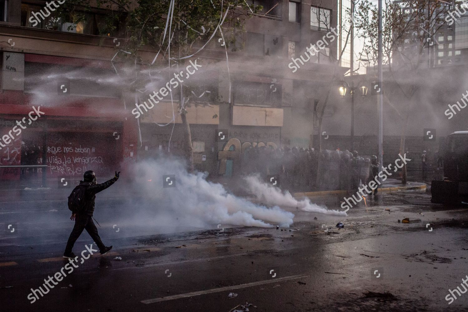 Protester Walks Amidst Tear Gas Smoke Editorial Stock Photo - Stock ...