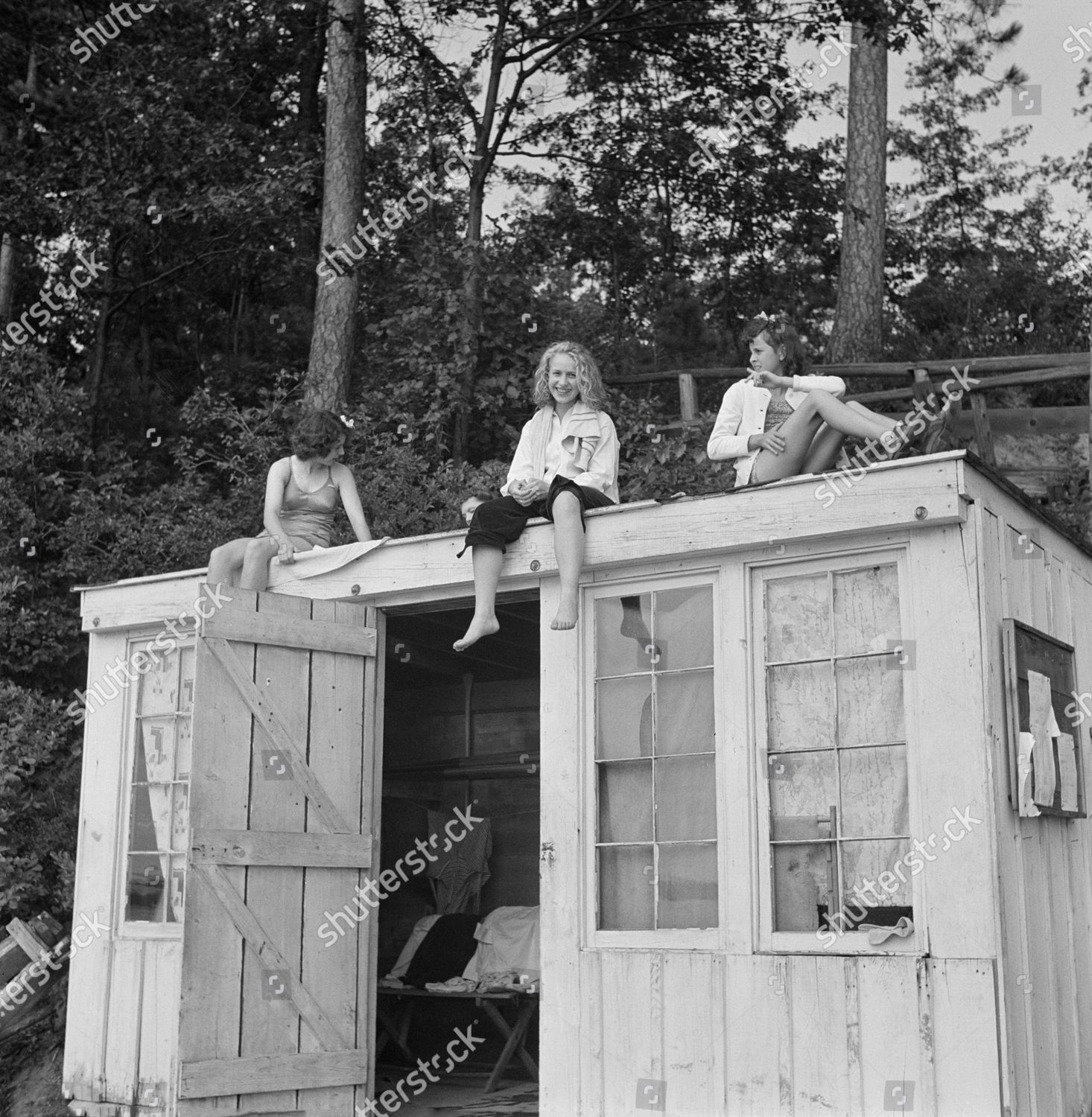Three Girls Sunning Themselves After Swim Editorial Stock Photo - Stock ...