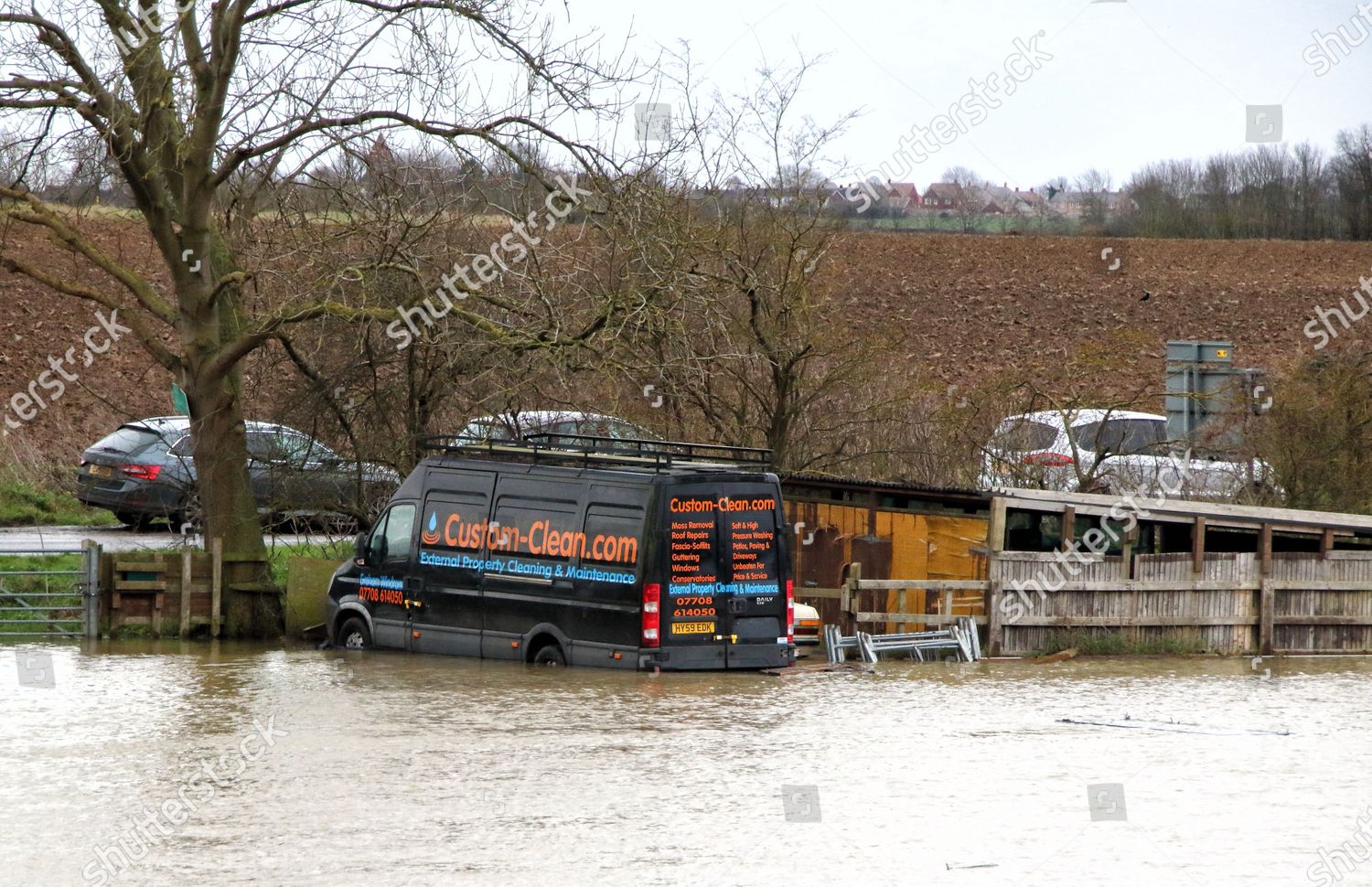 Parked Van Surrounded By Water Widespread Editorial Stock Photo - Stock ...