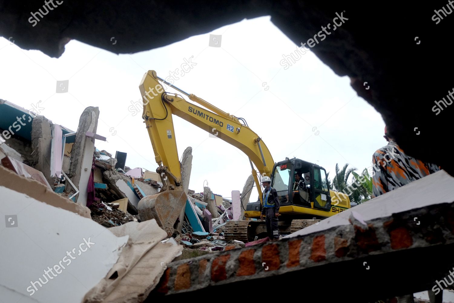 Excavator Works On Damaged Buildings During Editorial Stock Photo ...