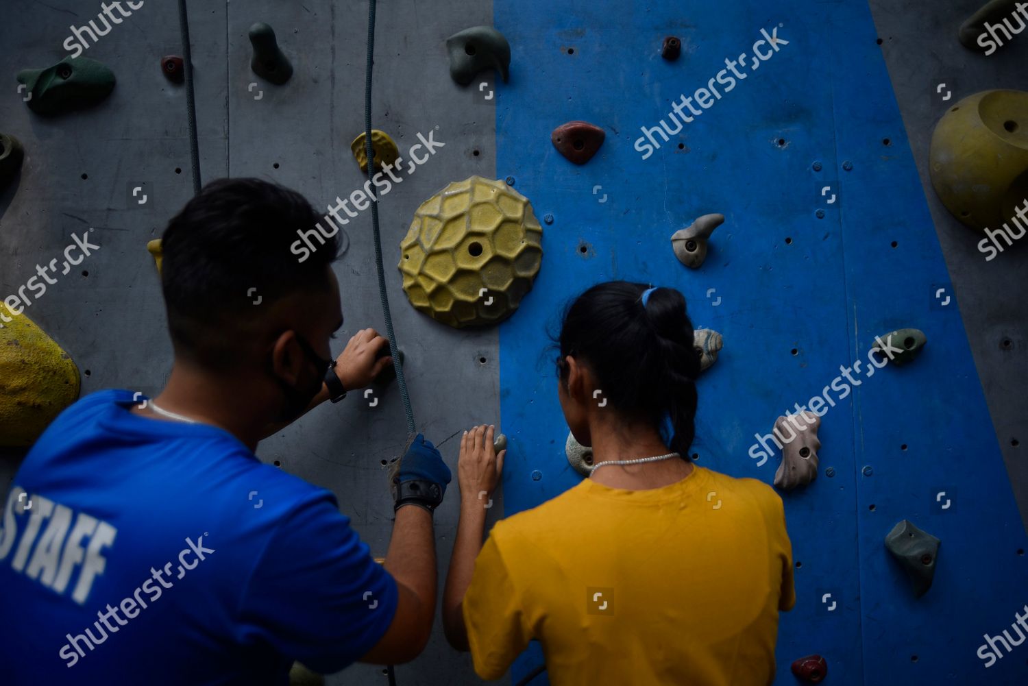 Staff Helps By Giving Directions Guiding Editorial Stock Photo - Stock ...