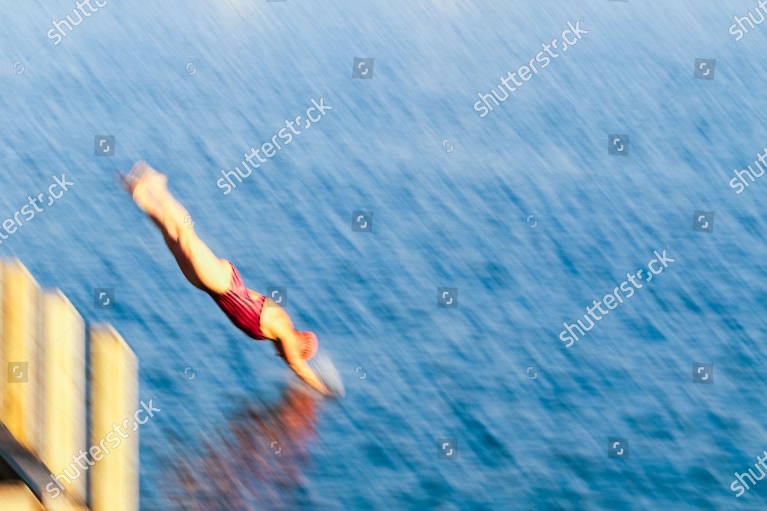 SWIMMER DIVING INTO WATER BRIGHTON PIER Editorial Stock Photo - Stock ...