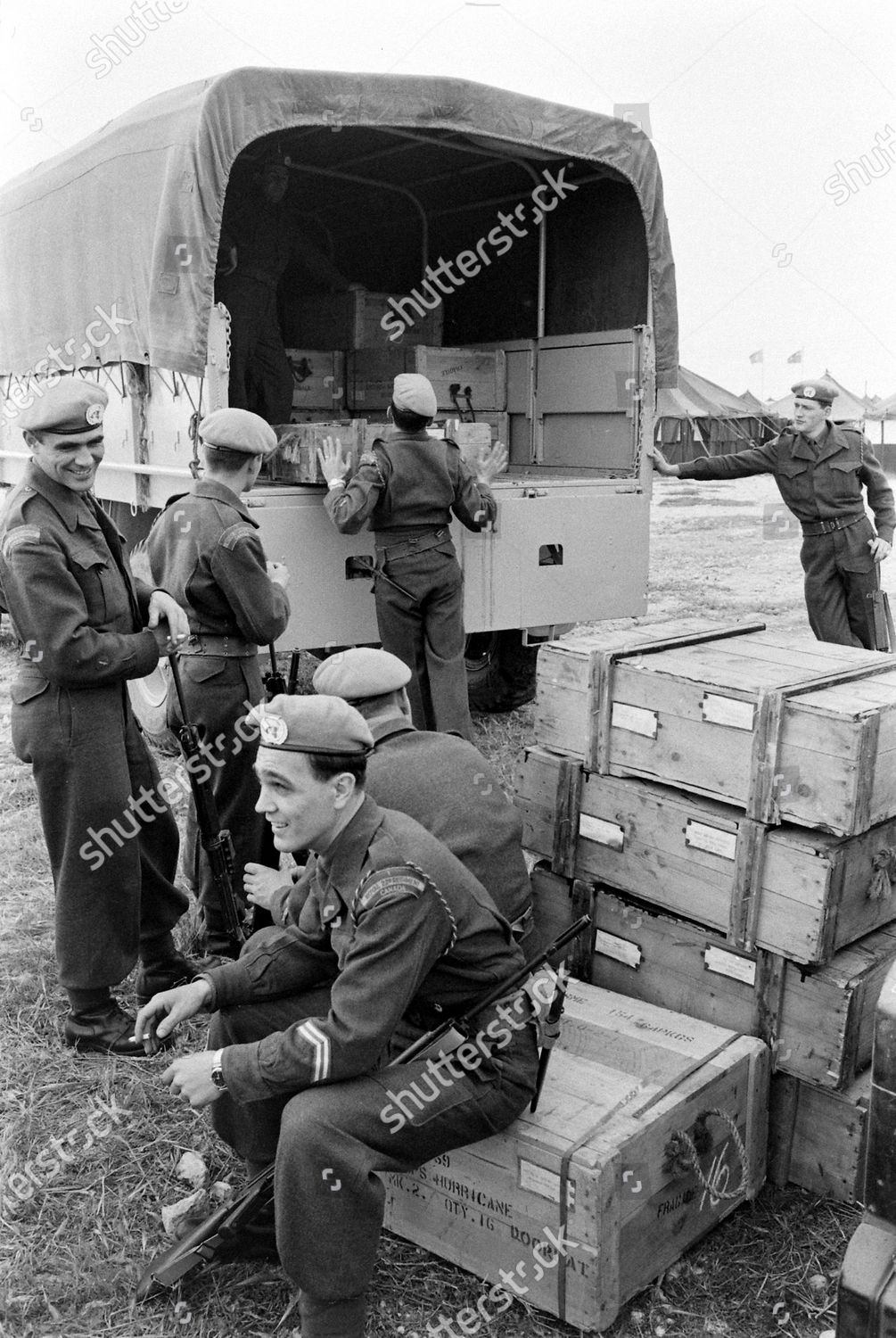 Officer Loading Crate Into Truck During Editorial Stock Photo - Stock ...