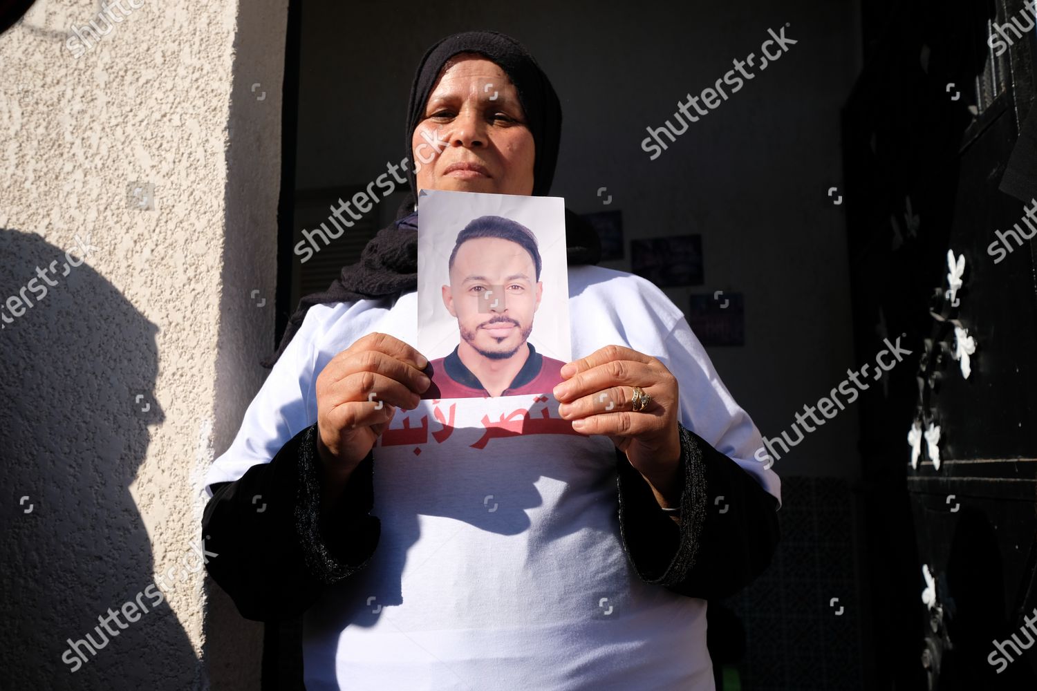 Mother Ahmed Ben Amara Holds Photo Editorial Stock Photo - Stock Image | Shutterstock