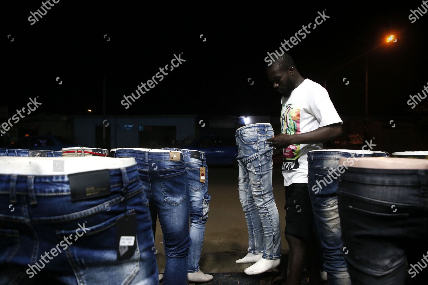 Man Sells Clothes On Street Abidjan Editorial Stock Photo - Stock Image ...