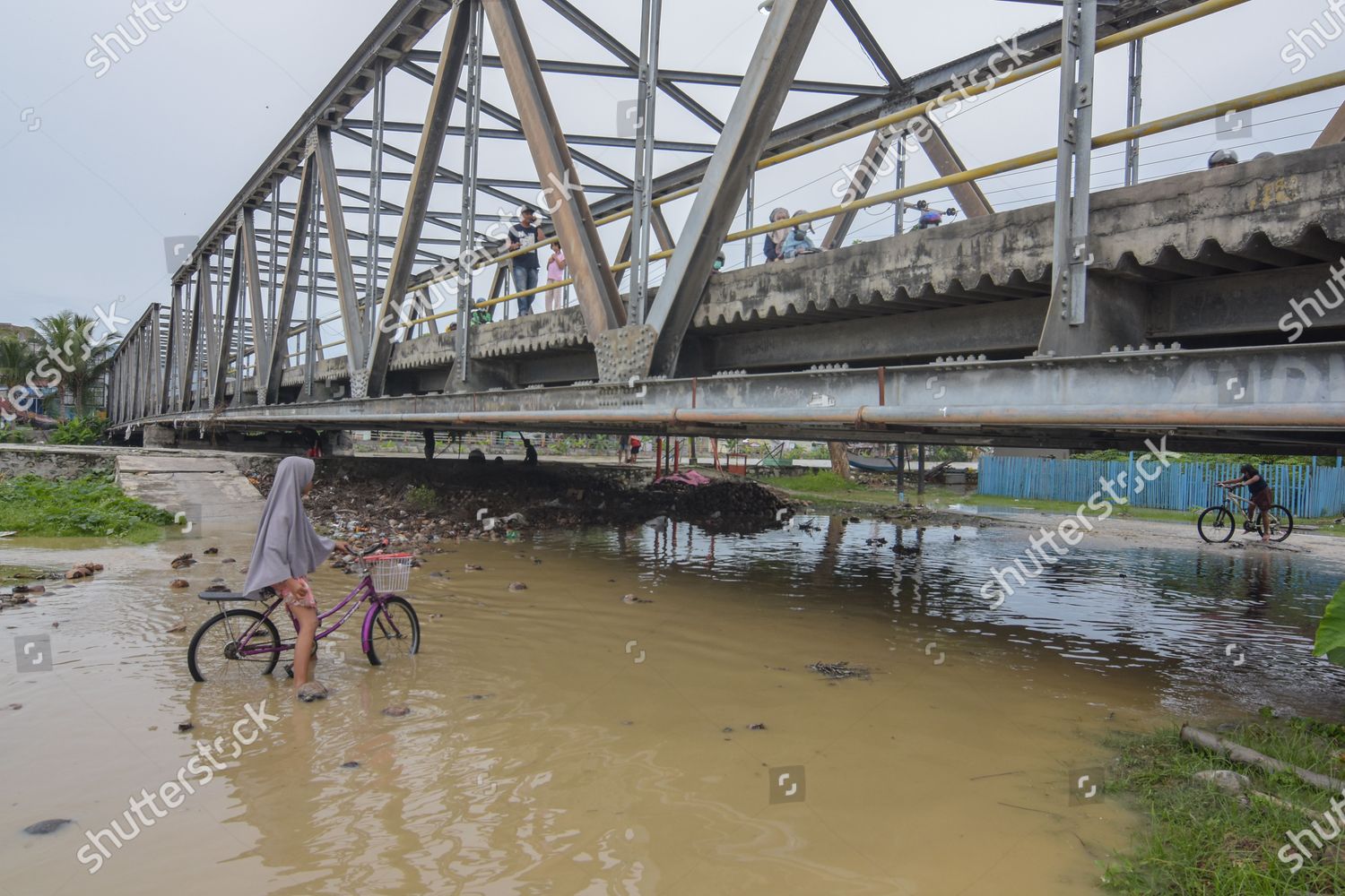 Child Cycles Through Puddle Water Caused Editorial Stock Photo - Stock ...