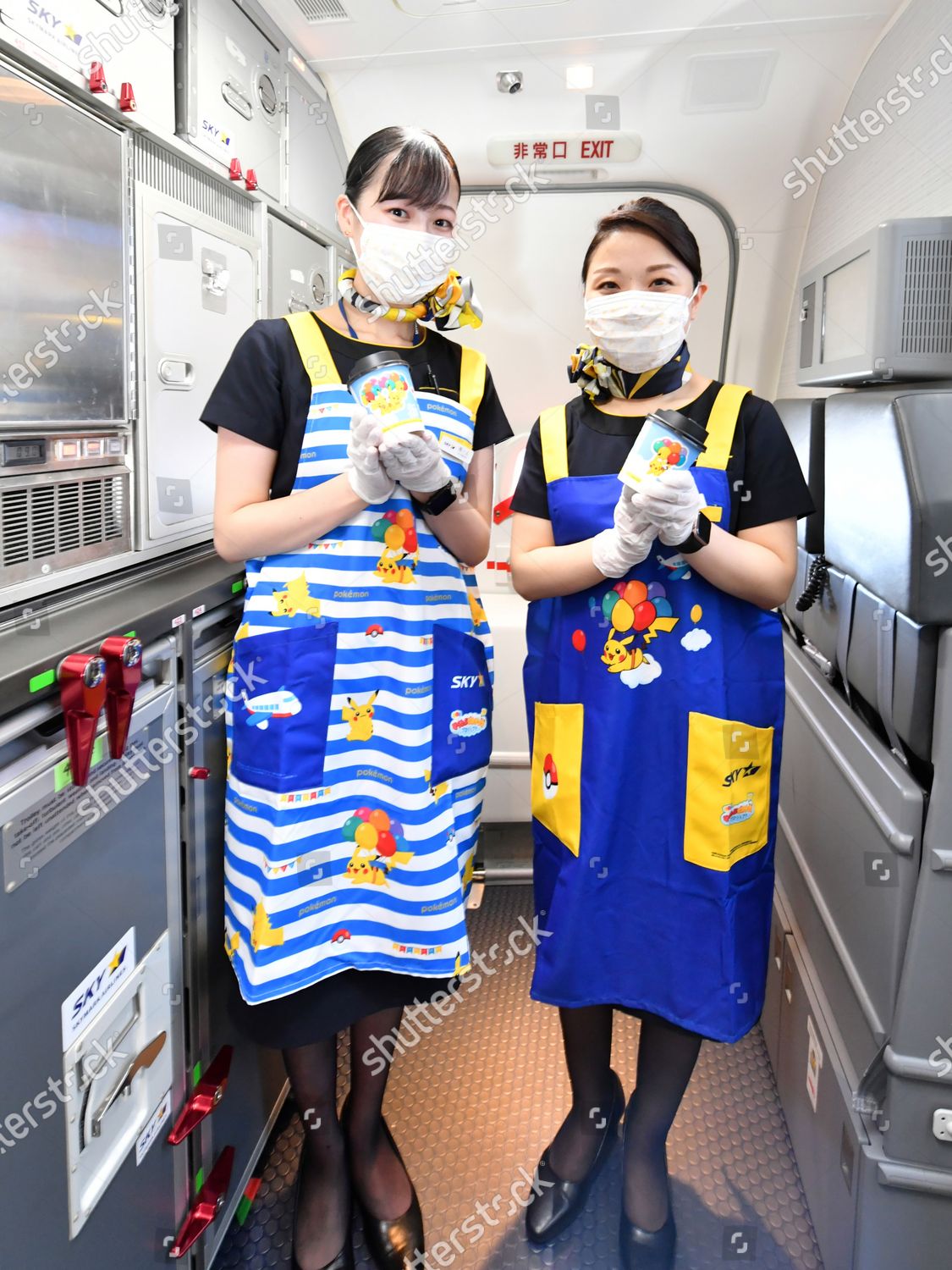 Skymark Airlines Flight Attendants Holding Special Editorial Stock ...