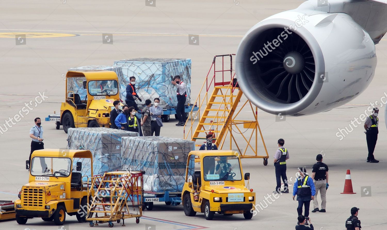Workers Move Cargo Carrying Some 255 Editorial Stock Photo - Stock ...