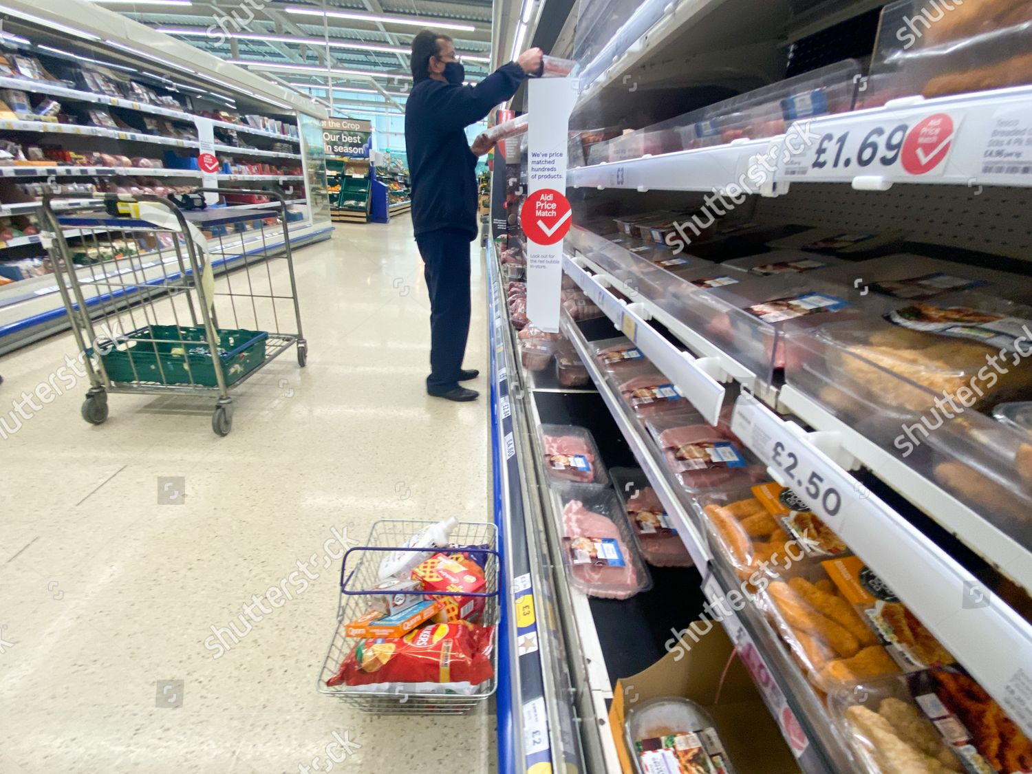 Staff Member On Isle Tesco Store Editorial Stock Photo - Stock Image ...