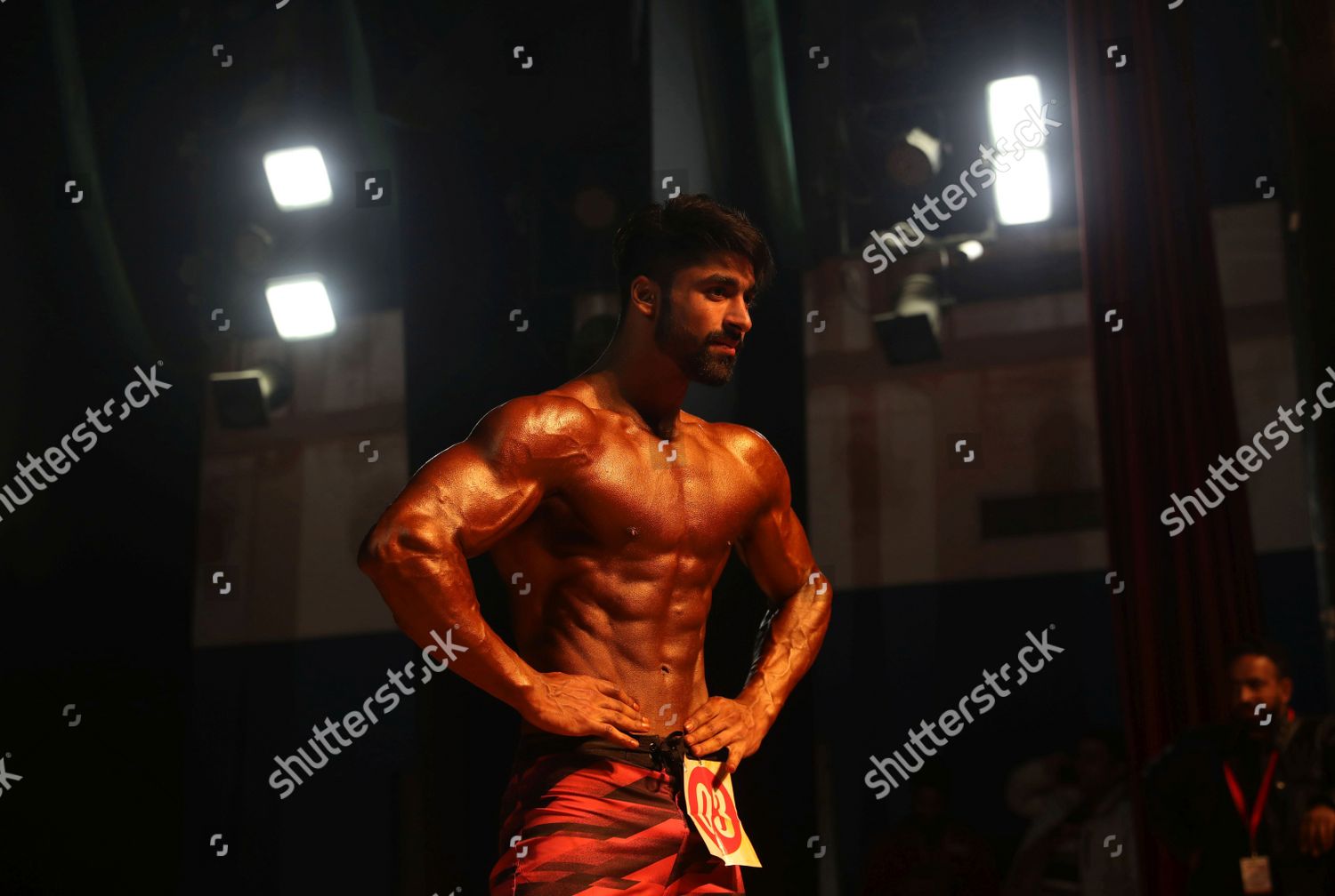 Kashmiri Bodybuilder Performs During Bodybuilding Competition Editorial ...