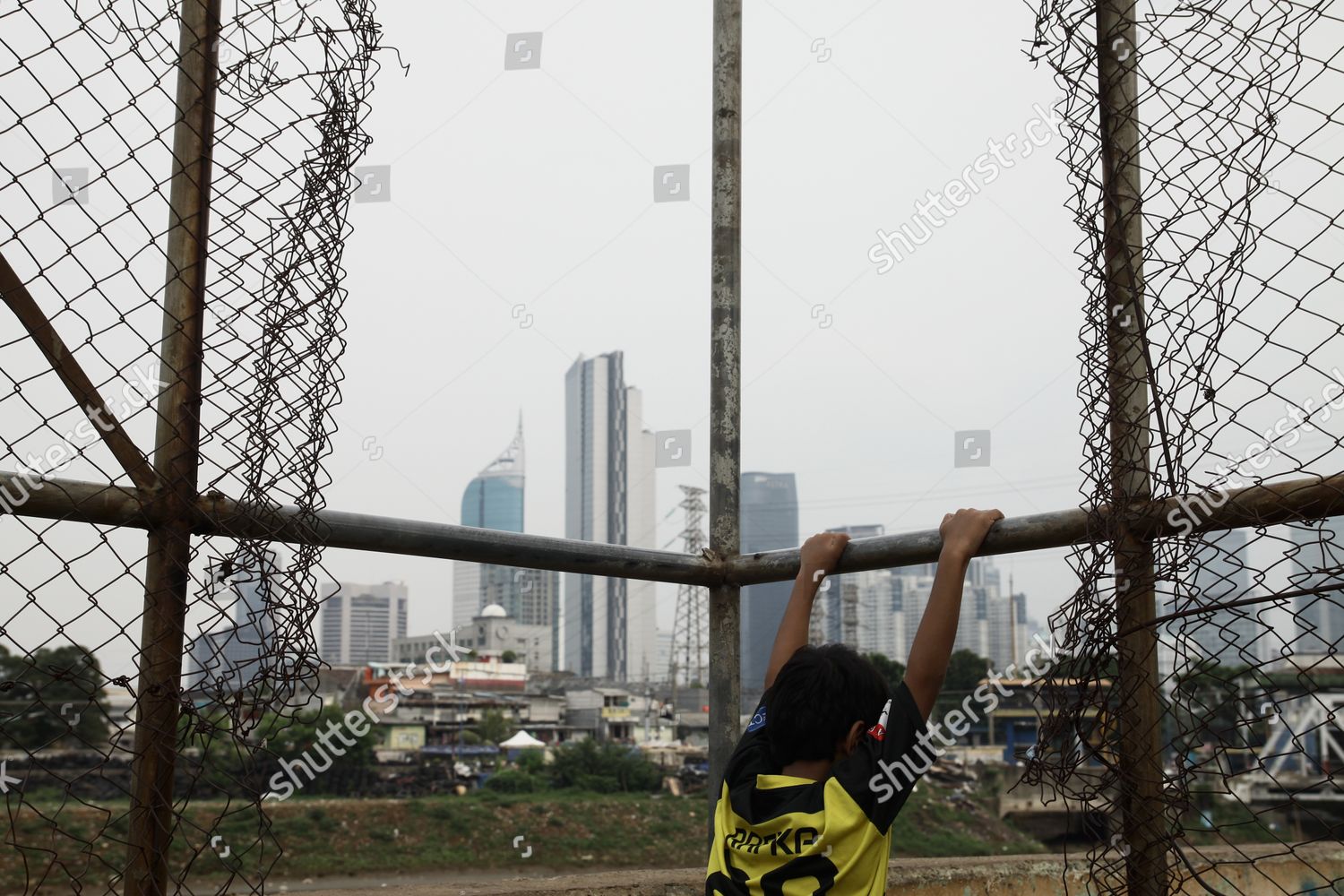 Boy Hanging On Fence One Slum Editorial Stock Photo - Stock Image ...