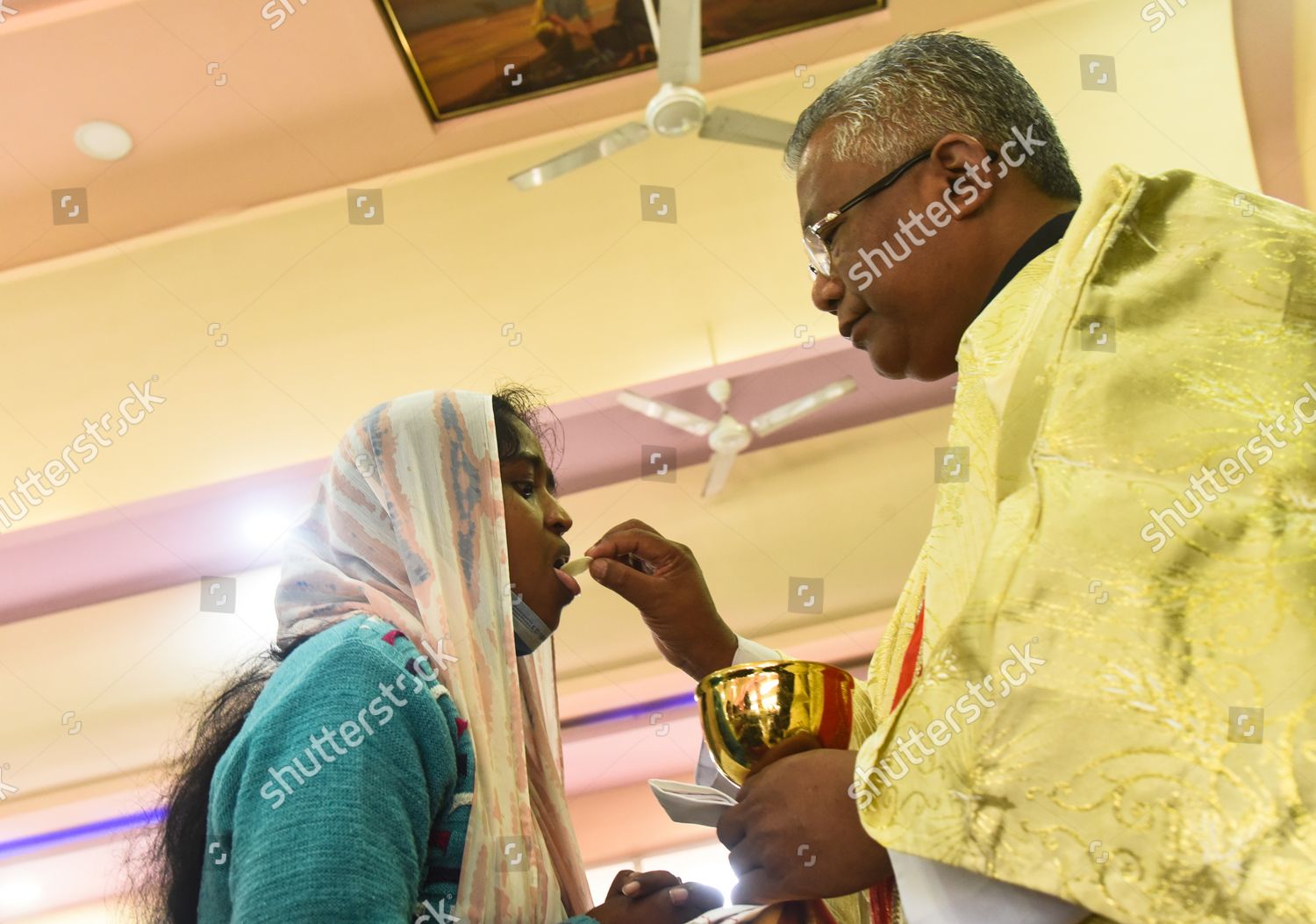 CHRISTIAN DEVOTEE TAKES HOLY COMMUNION PRIEST Editorial Stock Photo ...