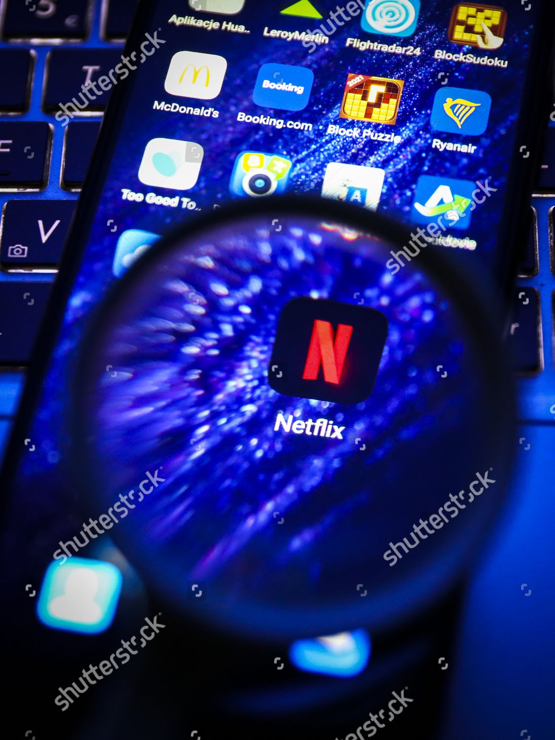 Netflix App Seen Through Magnifying Glass Editorial Stock Photo - Stock ...