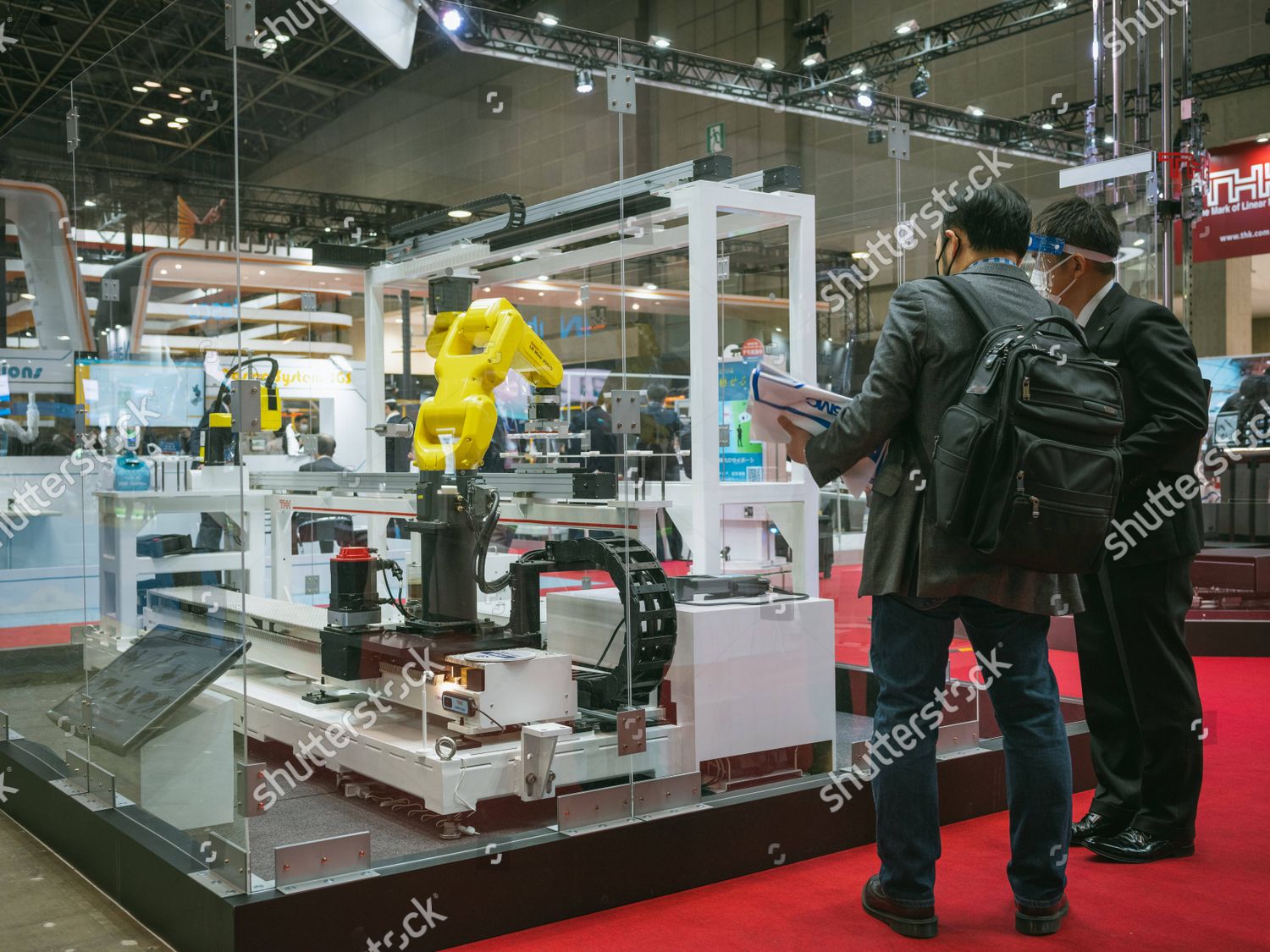 Visitors Stand Close Industrial Robotic Arm Editorial Stock Photo ...