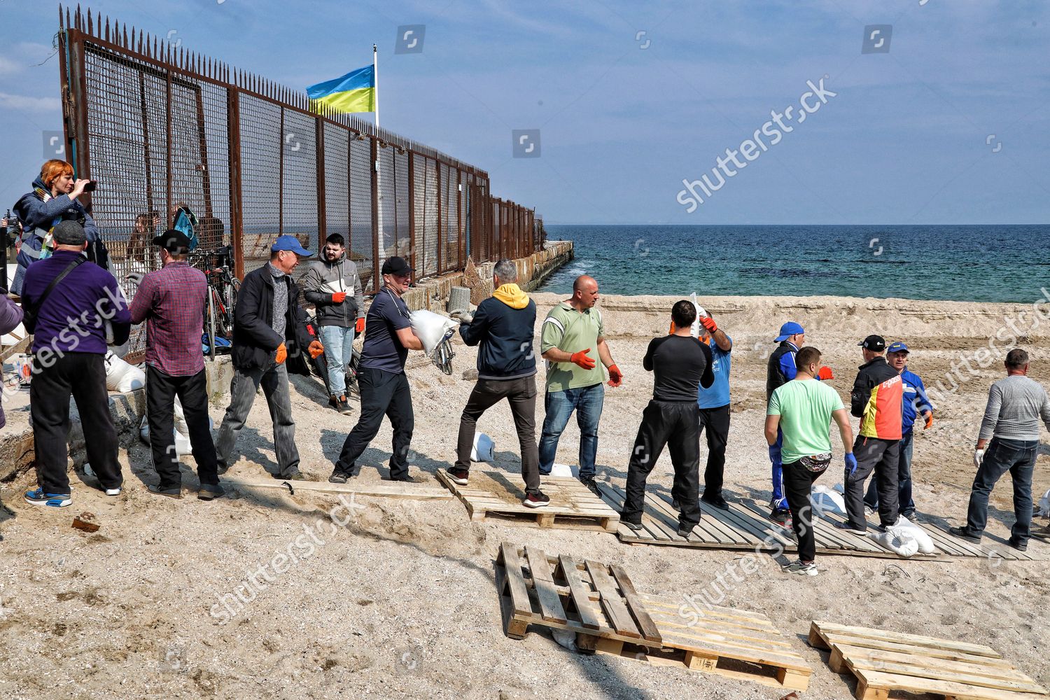Local Volunteers On Beach Pass Sandbags Editorial Stock Photo - Stock ...