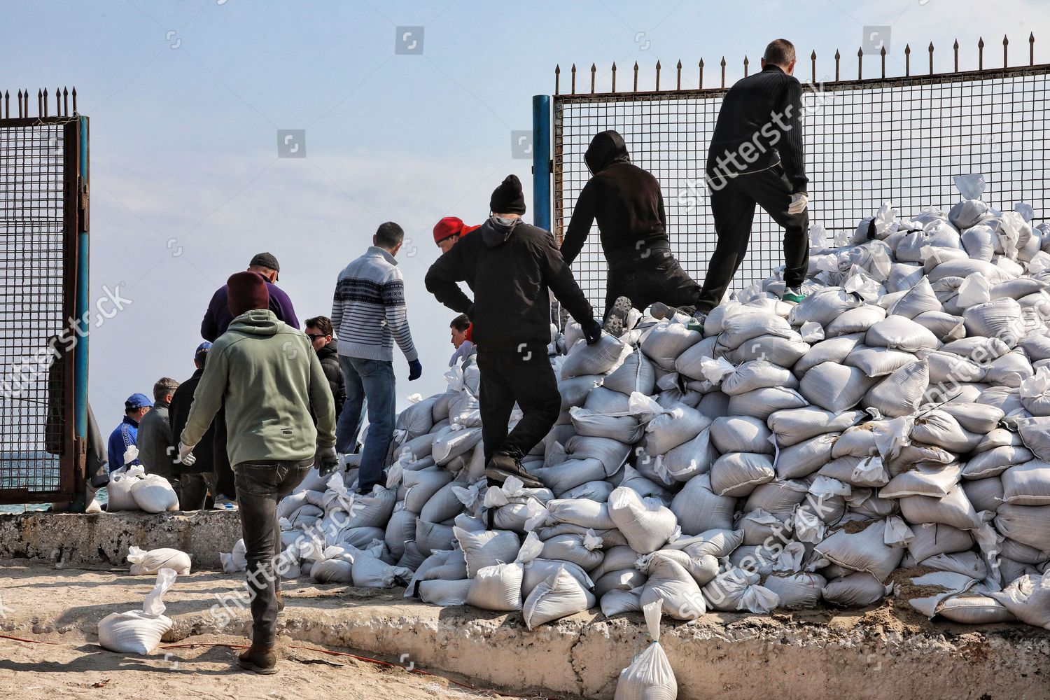 Local Volunteers On Beach Pass Sandbags Editorial Stock Photo - Stock ...