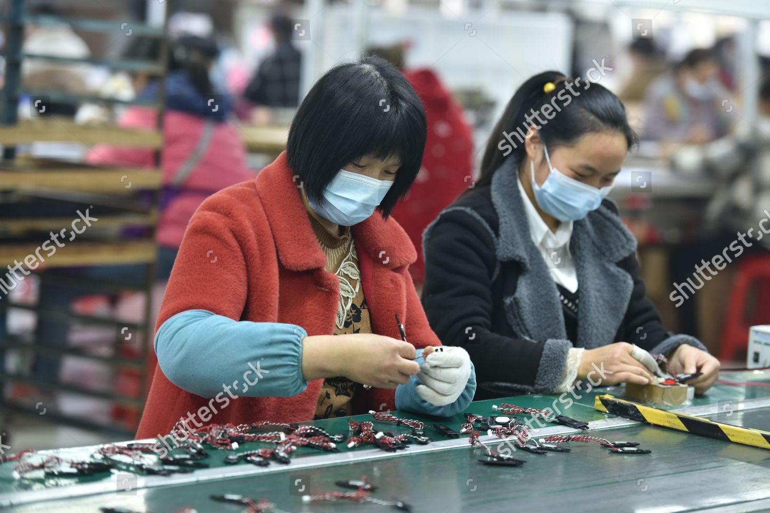 Women Wearing Masks Assemble Speakers On Editorial Stock Photo - Stock ...