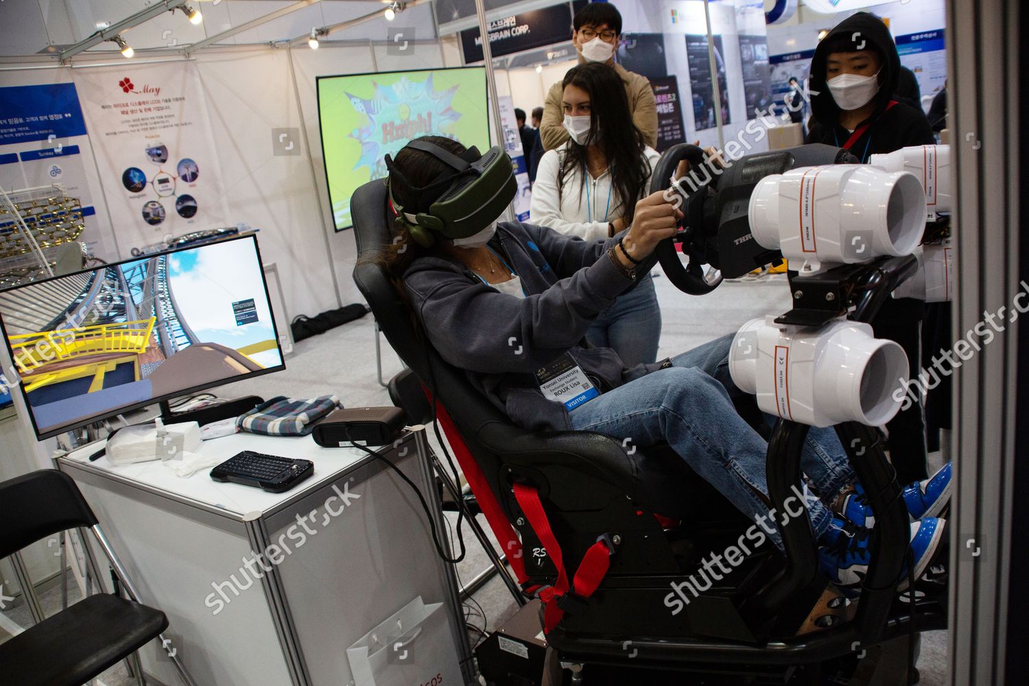 Visitors Experience Virtual Reality Simulator During Editorial Stock ...