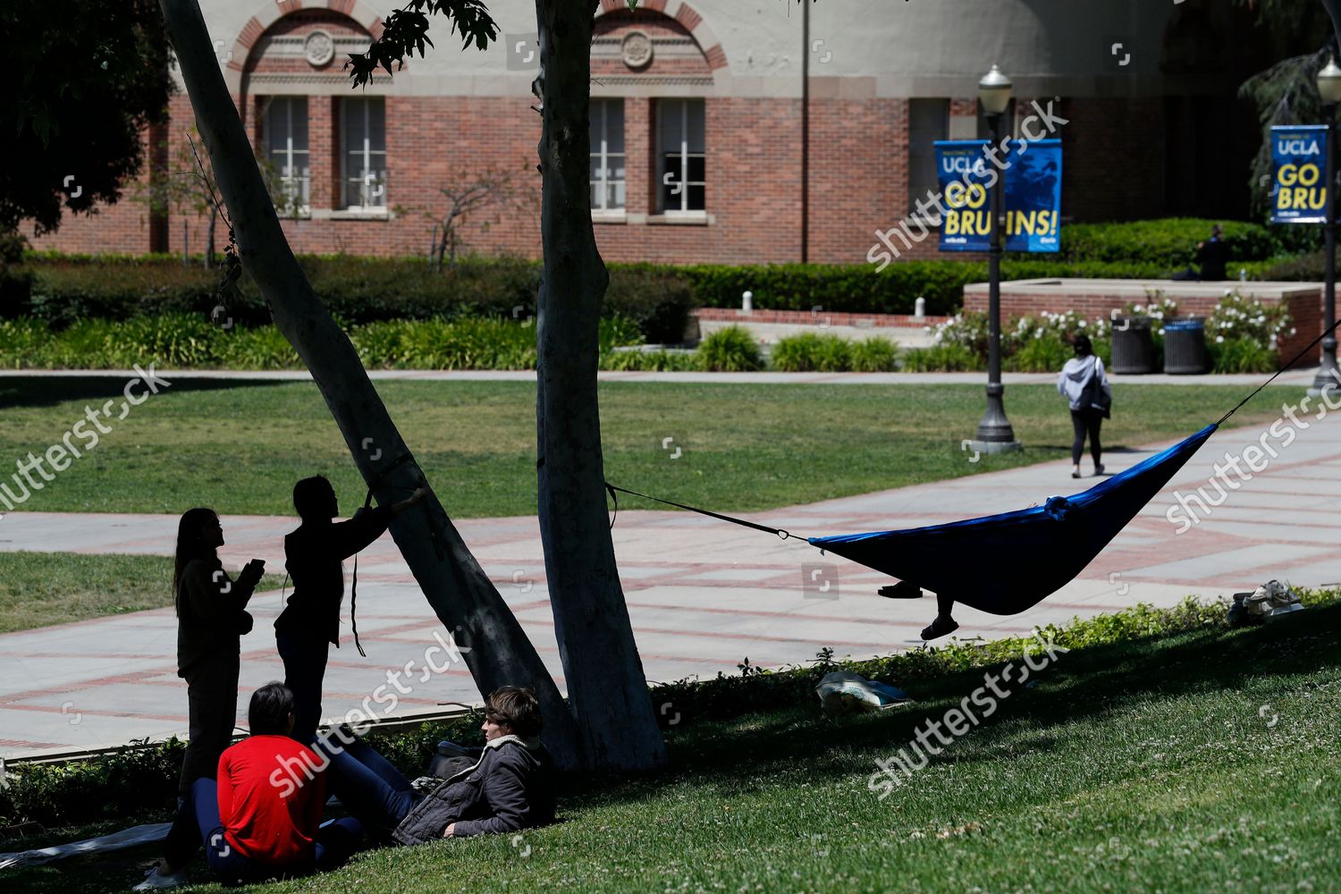 Students Lay Out On Grass On Editorial Stock Photo - Stock Image ...