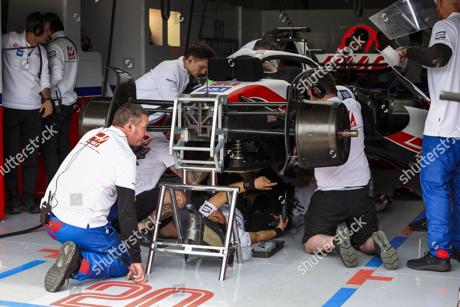 HAAS F1 TEAM MECHANIC WORKING ON Editorial Stock Photo - Stock Image ...