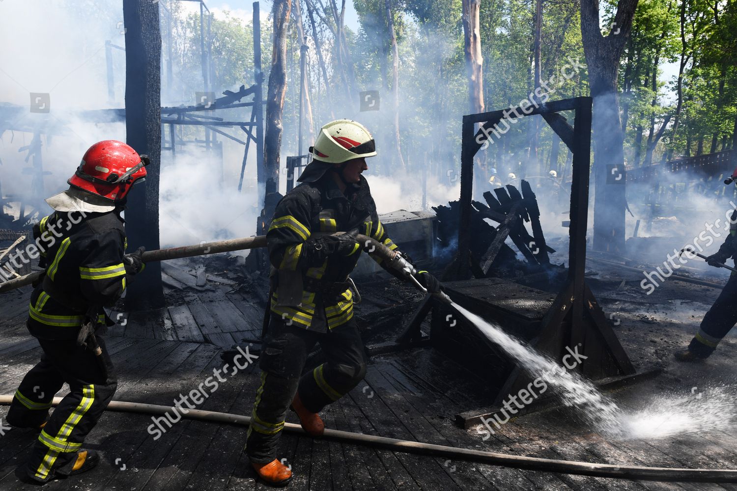 Firefighters Extinguish Fire Created By Rockets Editorial Stock Photo ...