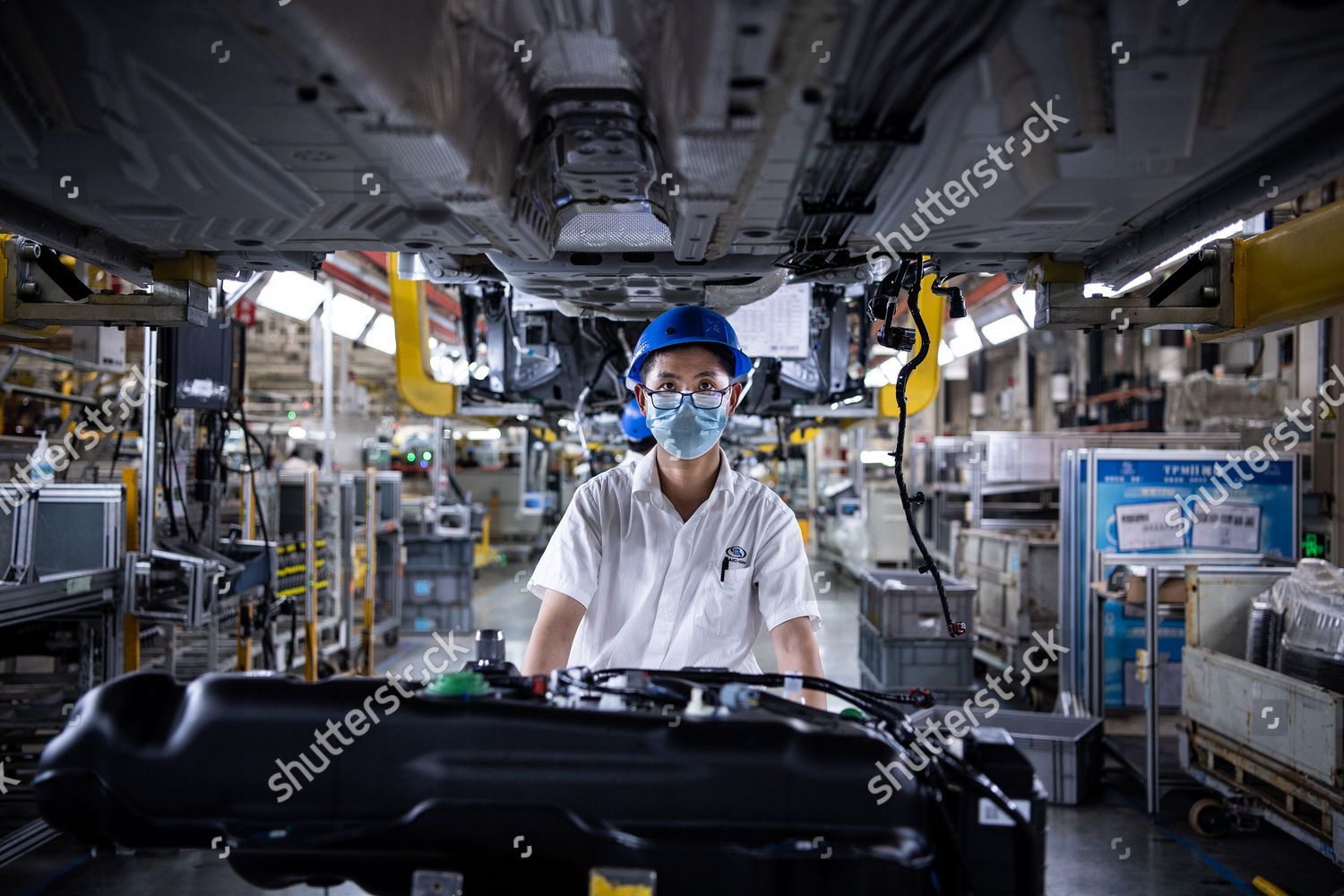 Employee Wearing Mask Works On Car Editorial Stock Photo - Stock Image ...