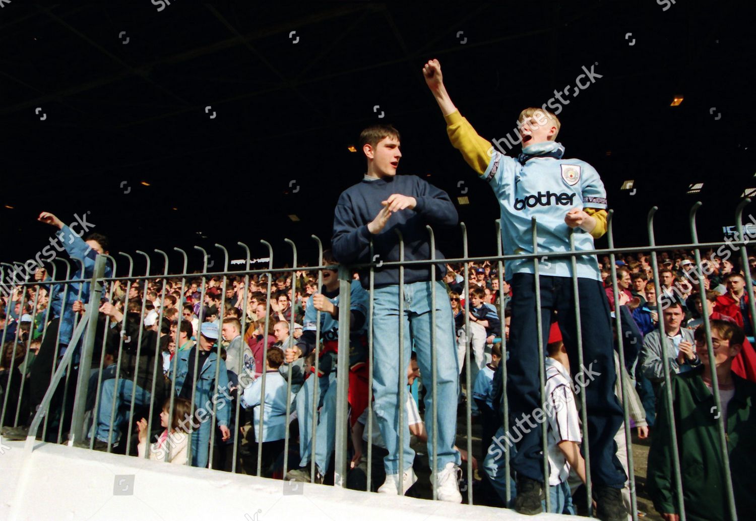 Fans Stand On Terraces Behind Fencing Editorial Stock Photo - Stock ...