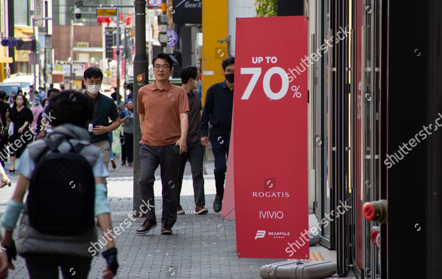 People Walk Past Sale Sign Outside Editorial Stock Photo - Stock Image ...