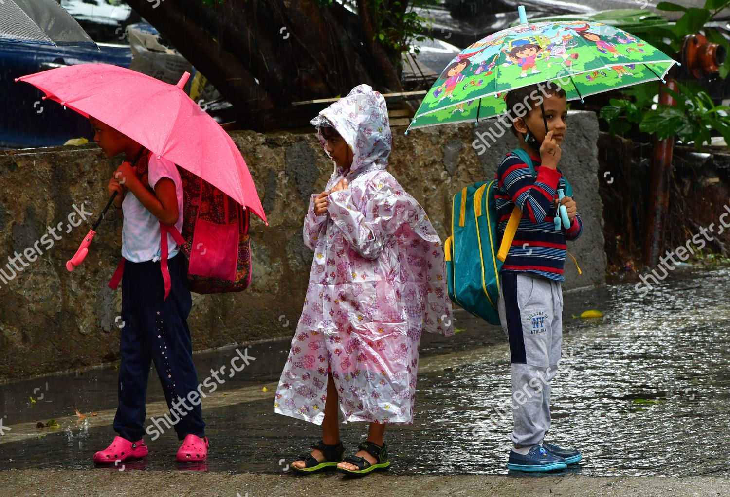 School Children Walk Heavy Rain Wearing Editorial Stock Photo - Stock ...
