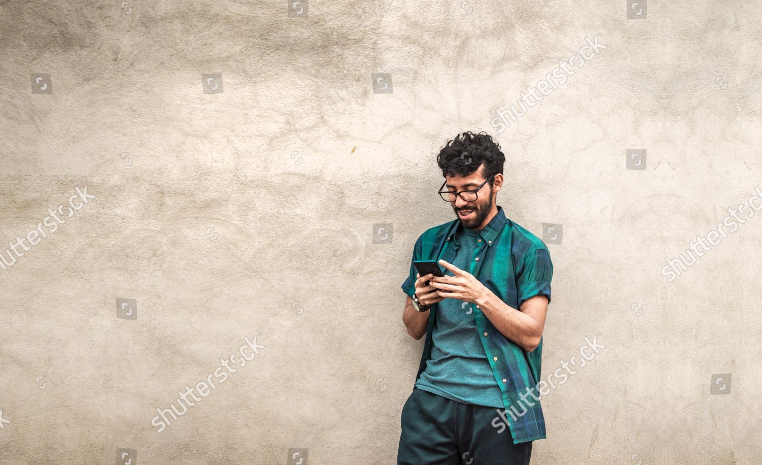 Happy Handsome Guy Leaning Against Wall Editorial Stock Photo - Stock ...