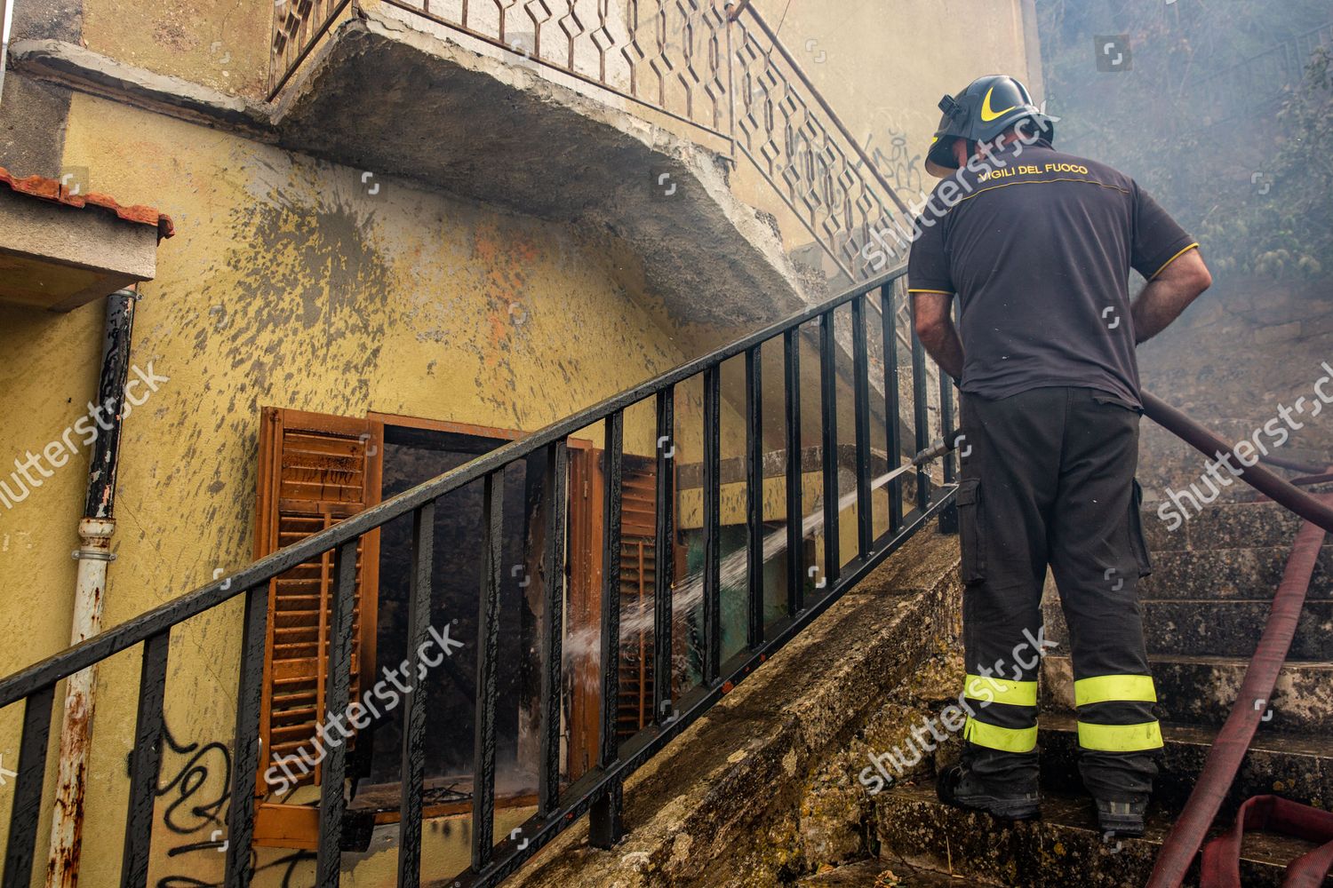 Firefighter Puts Out Fire That Burned Editorial Stock Photo - Stock ...