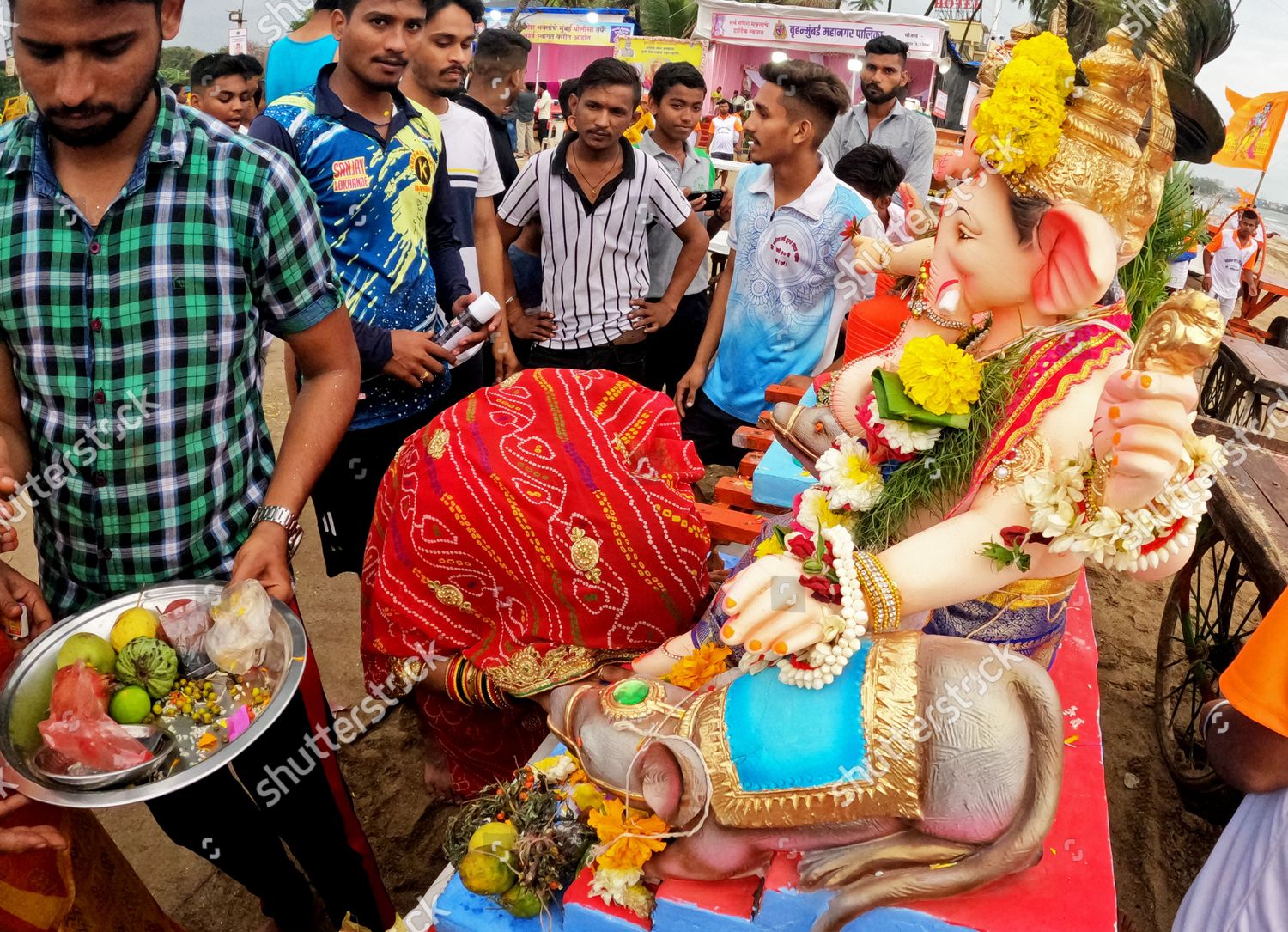 Devotees Offer Prayers Before Immersing Idol Editorial Stock Photo ...