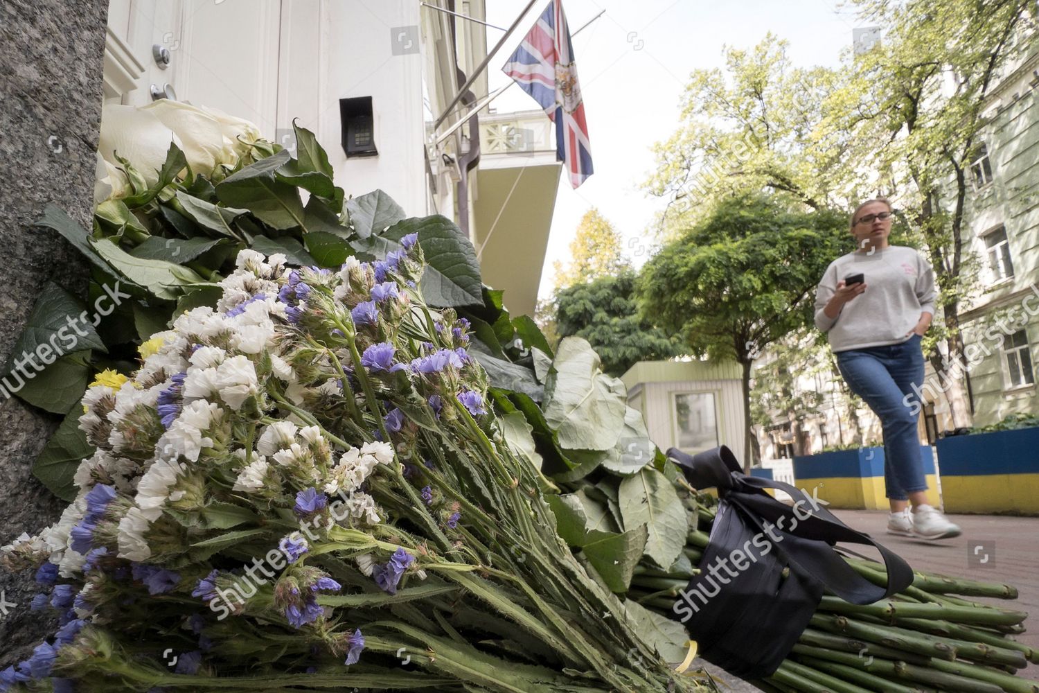 Woman Passes By Flowers Mourn Death Editorial Stock Photo - Stock Image ...