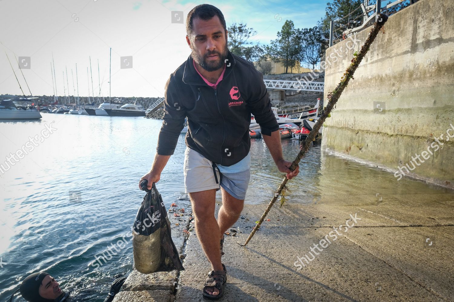 Man Receives Garbage Collected By Diver Editorial Stock Photo - Stock ...