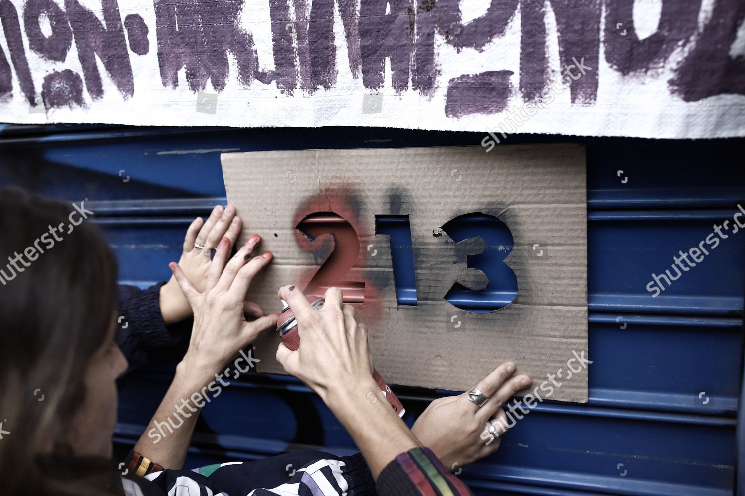 Women Spray Paint On Number 213 Editorial Stock Photo - Stock Image ...