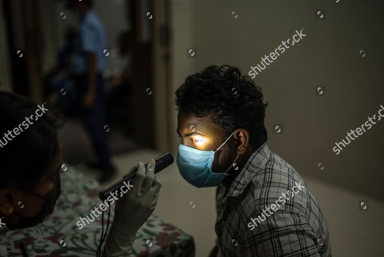 Indian Doctor Uses Torch Examine Eye Editorial Stock Photo - Stock ...