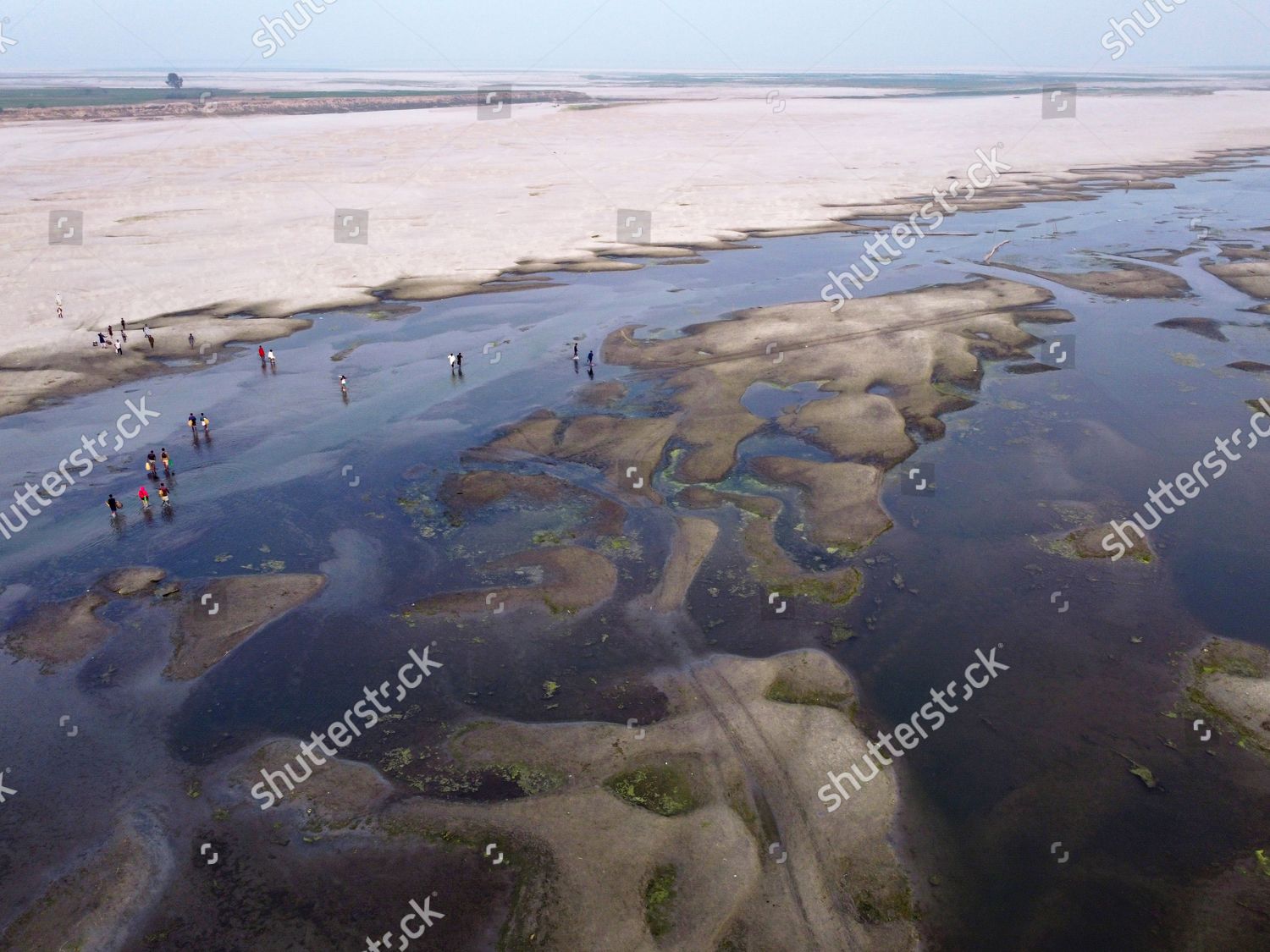 Passengers Walk Across Dry Riverbed On Editorial Stock Photo - Stock ...