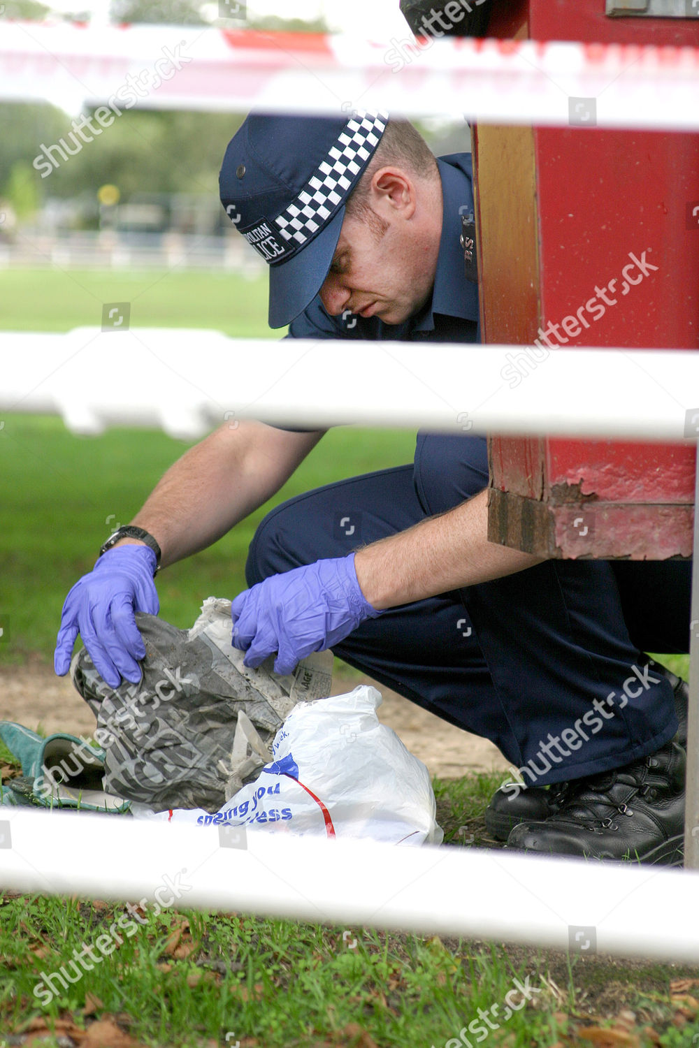 Police Officer Searches Evidence Waste Bins Editorial Stock Photo ...