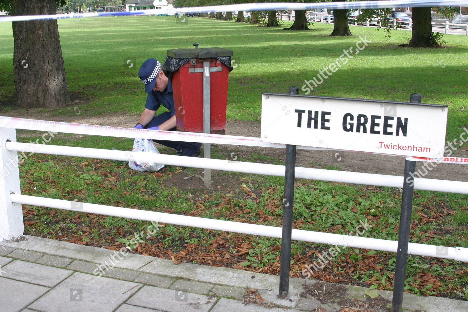 Police Officer Searches Evidence Waste Bins Editorial Stock Photo ...