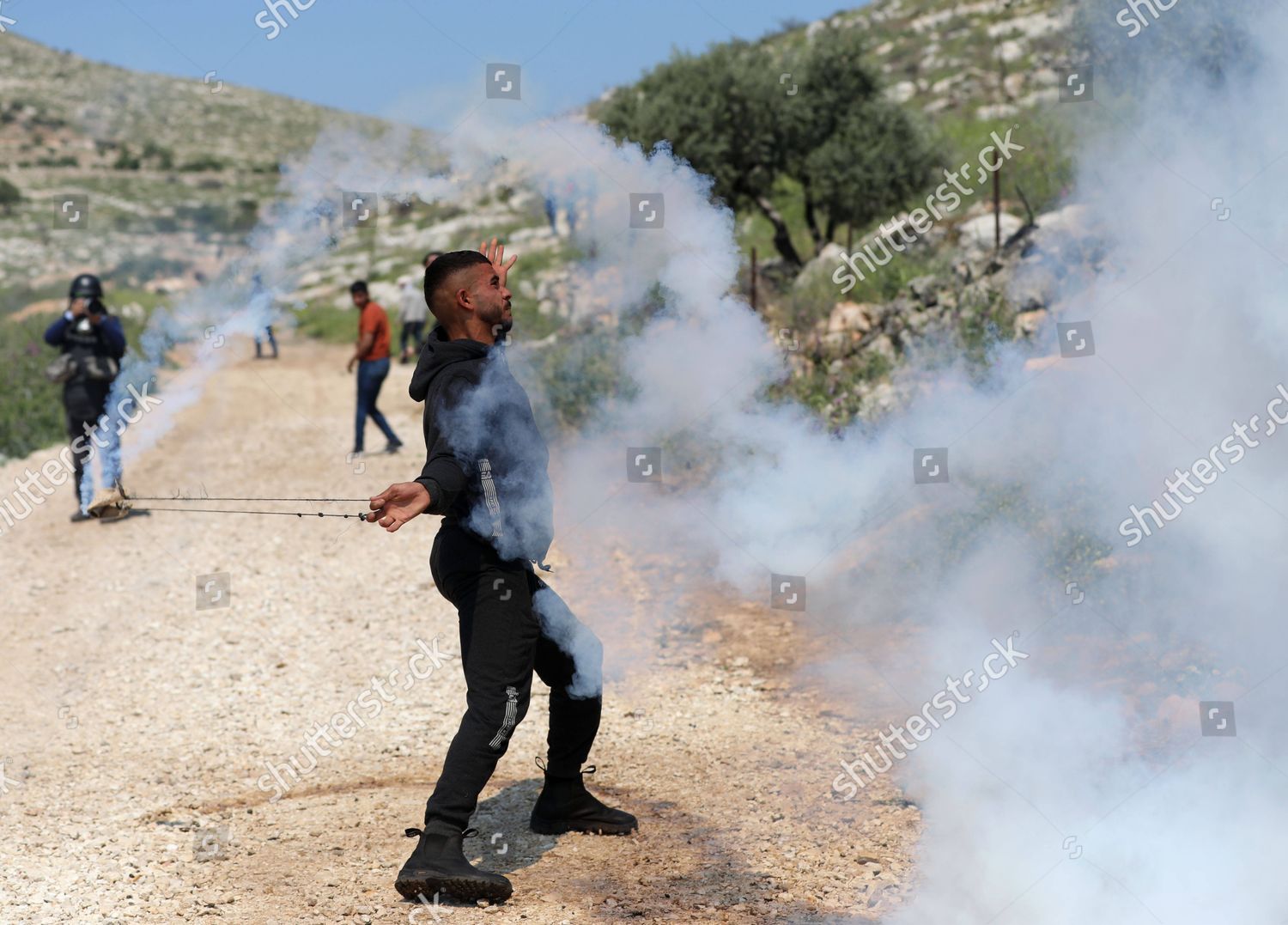 Palestinian Protester Uses Slingshot Hurl Back Editorial Stock Photo ...