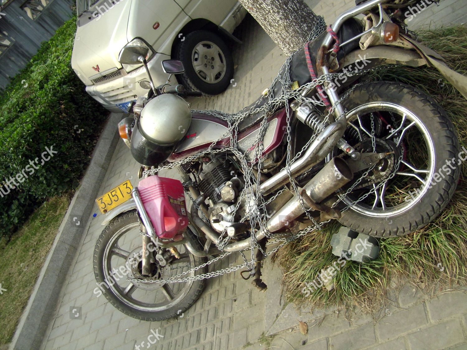 Motorcycle Chained Tree Editorial Stock Photo - Stock Image | Shutterstock
