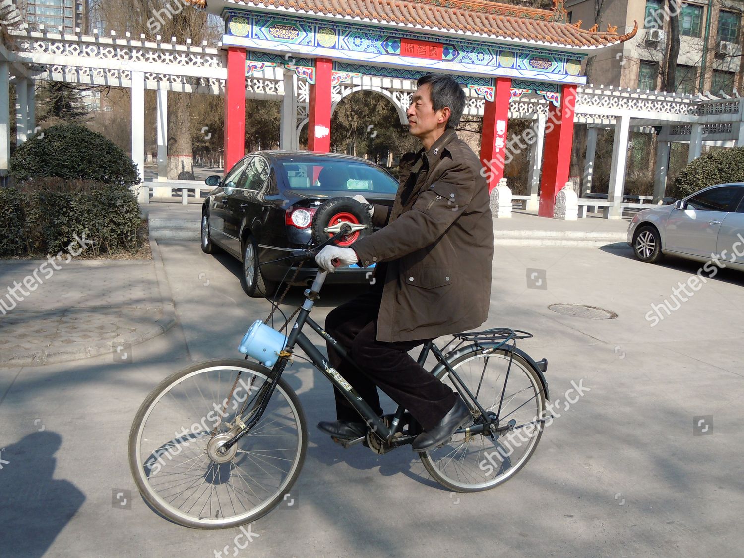 Yu Jianming Rides His Bike By Editorial Stock Photo - Stock Image ...