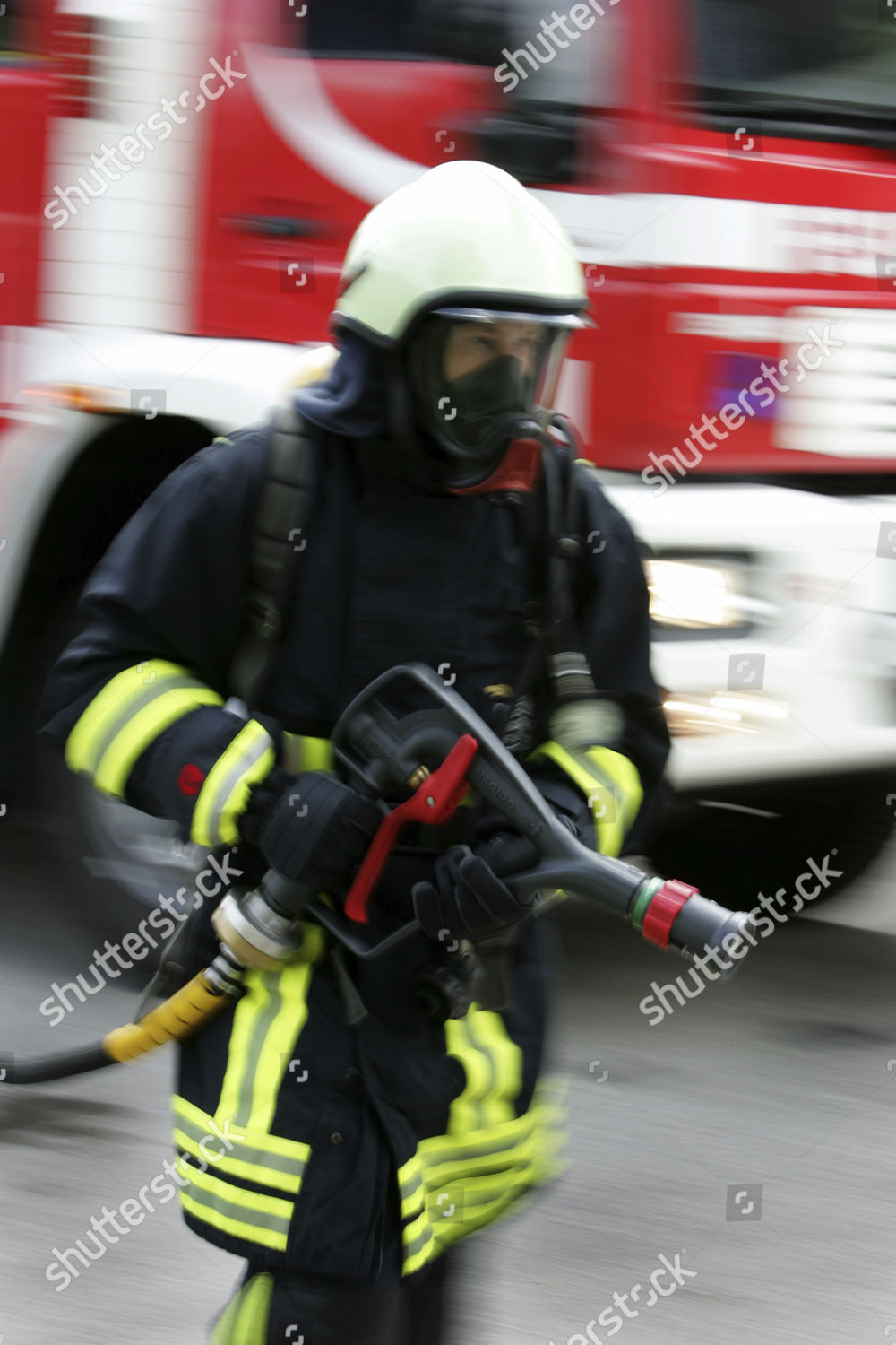 Fire Fighter Quick Action Fire Hose Editorial Stock Photo - Stock Image ...