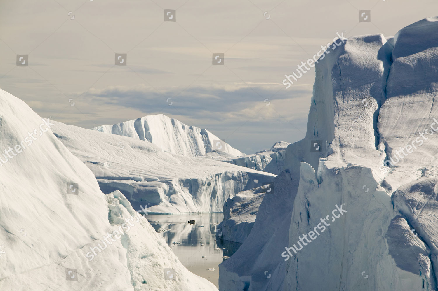 Inuit Fishing Boat Sails Through Icebergs Editorial Stock Photo - Stock ...